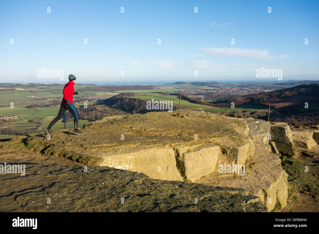 Trail runner/fell runner on summit of Roseberry Topping, North York ...