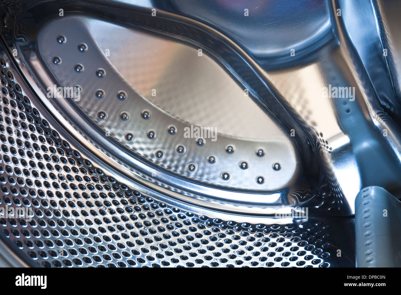 Perforated stainless steel drum for automatic washing machine Stock ...