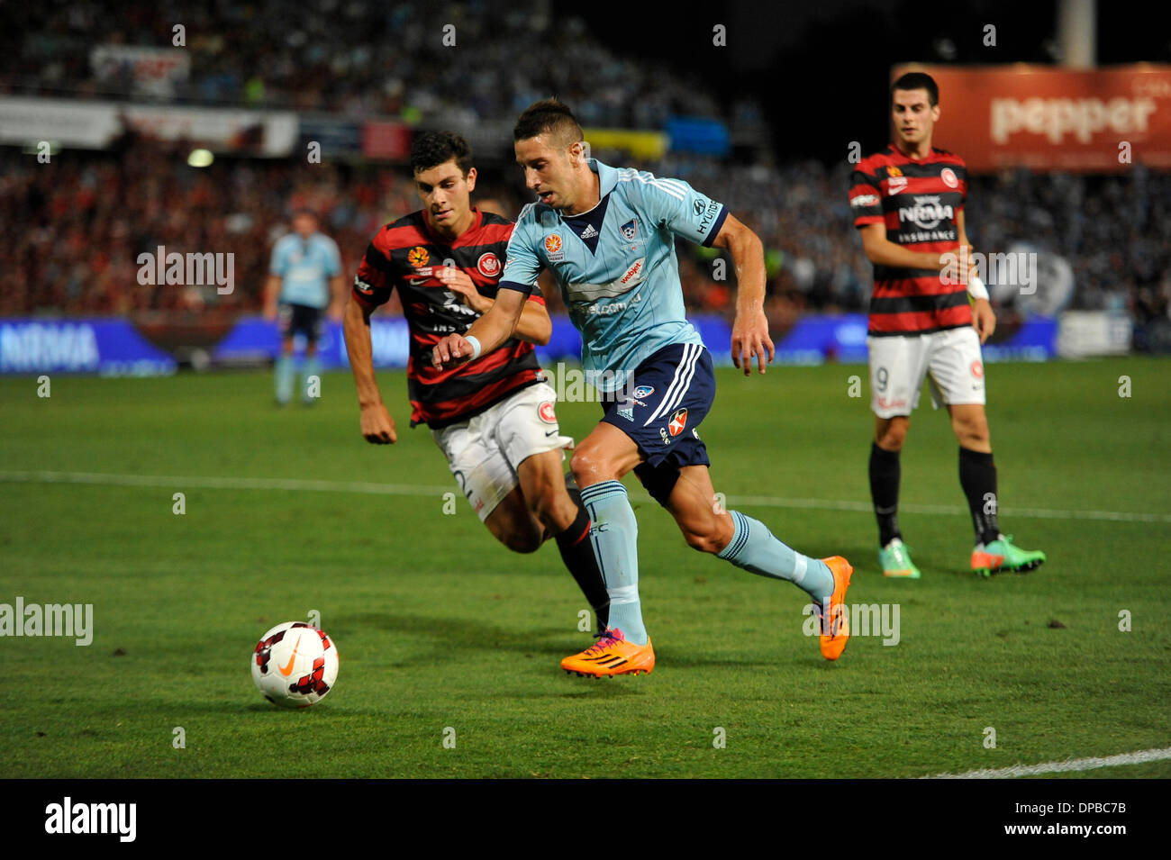Sydney, Australia. 11th Jan, 2014. Sydney defender Nikola Petkovic and ...