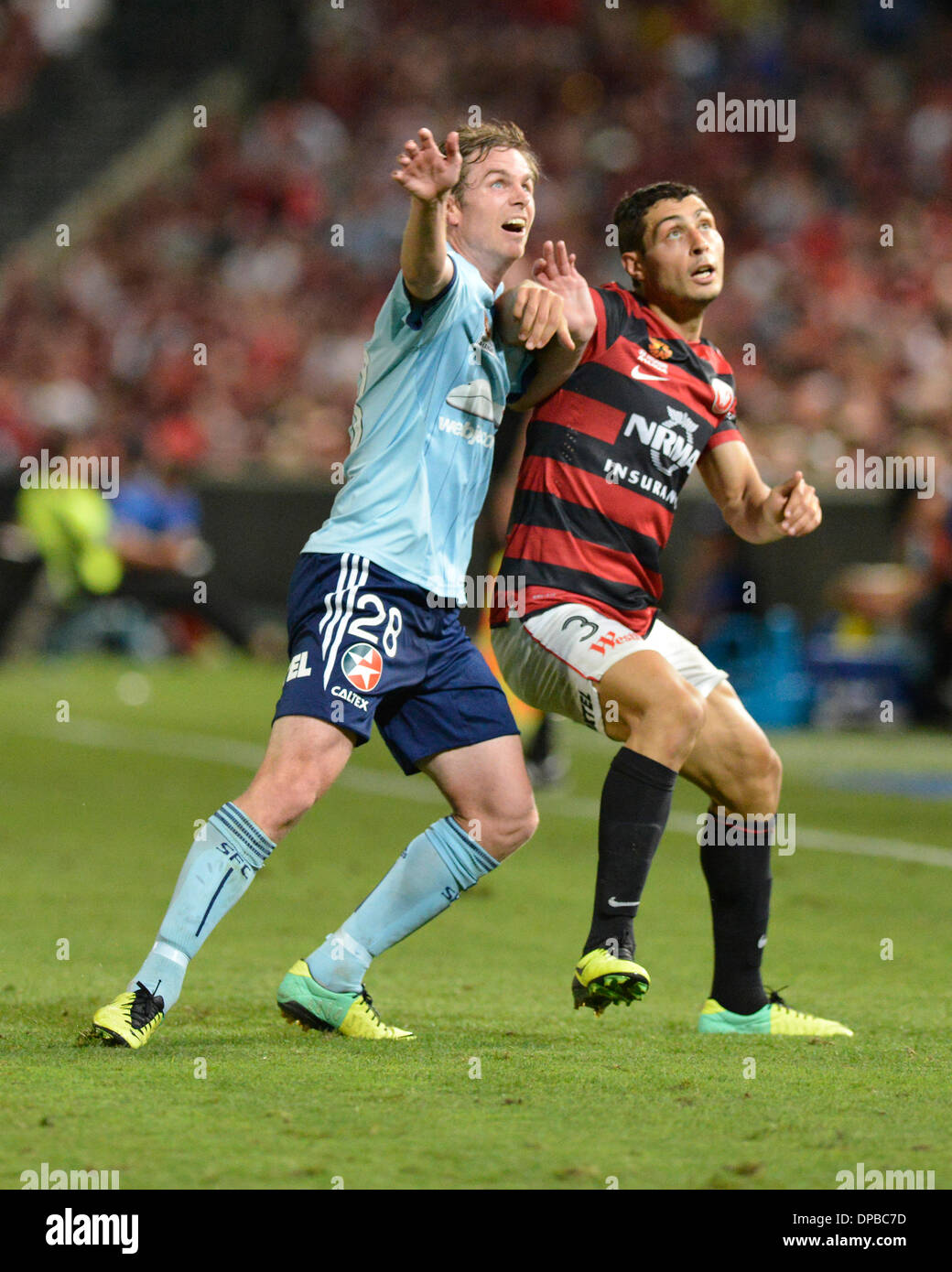 Sydney, Australia. 11th Jan, 2014. Sydney midfielder Matt Thompson and ...