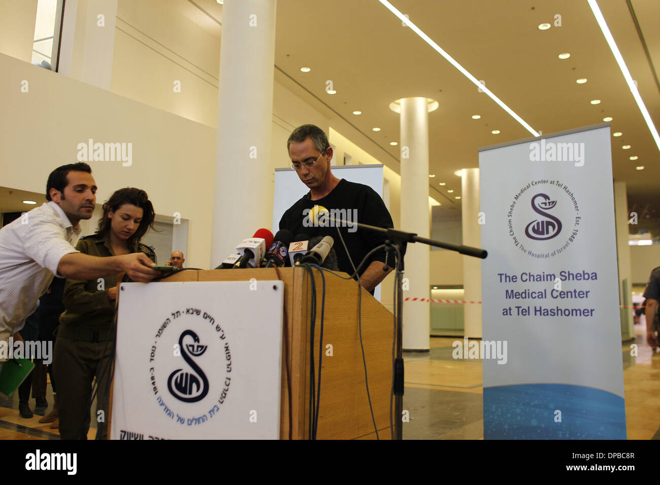 Tel Aviv, Israel. 11th Jan, 2014. Gilad Sharon (R), son of Ariel Sharon ...