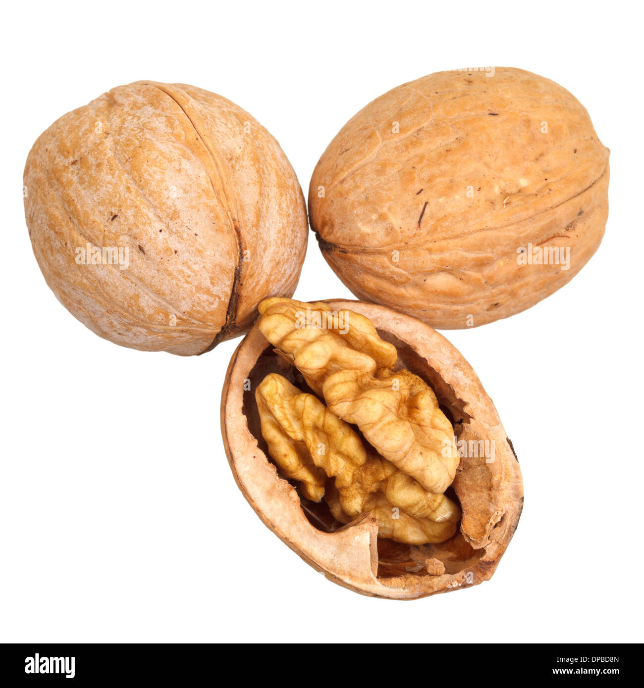 three walnuts close up isolated on white background Stock Photo - Alamy