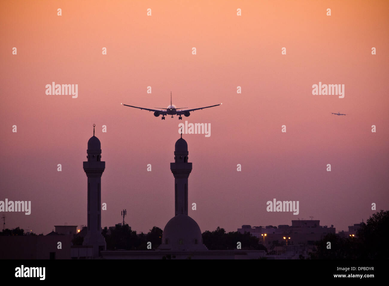 Airplane landing in dubai airport at early morning Stock Photo - Alamy