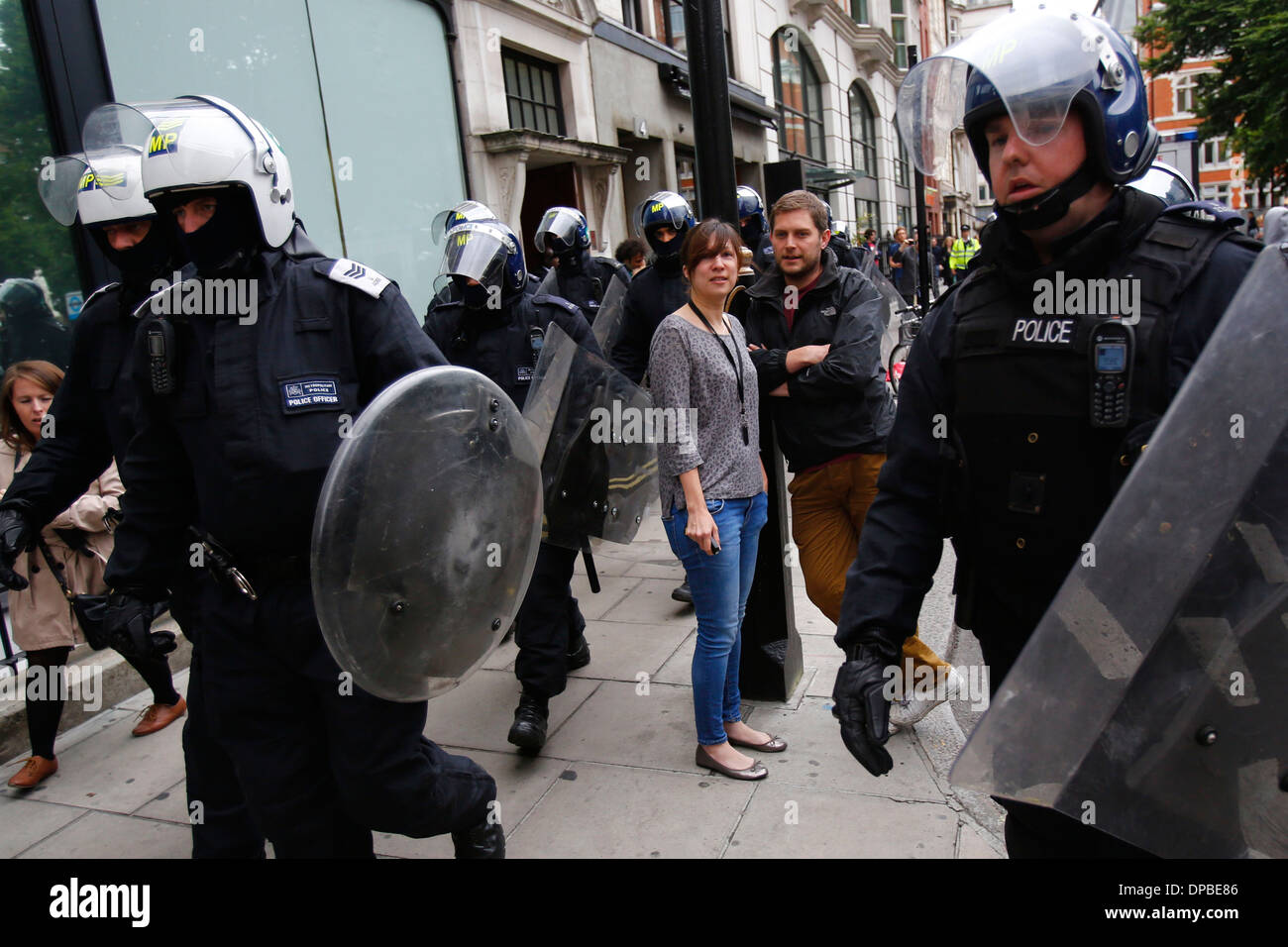 Metropolitan Police clash with protesters at Golden square in London ...