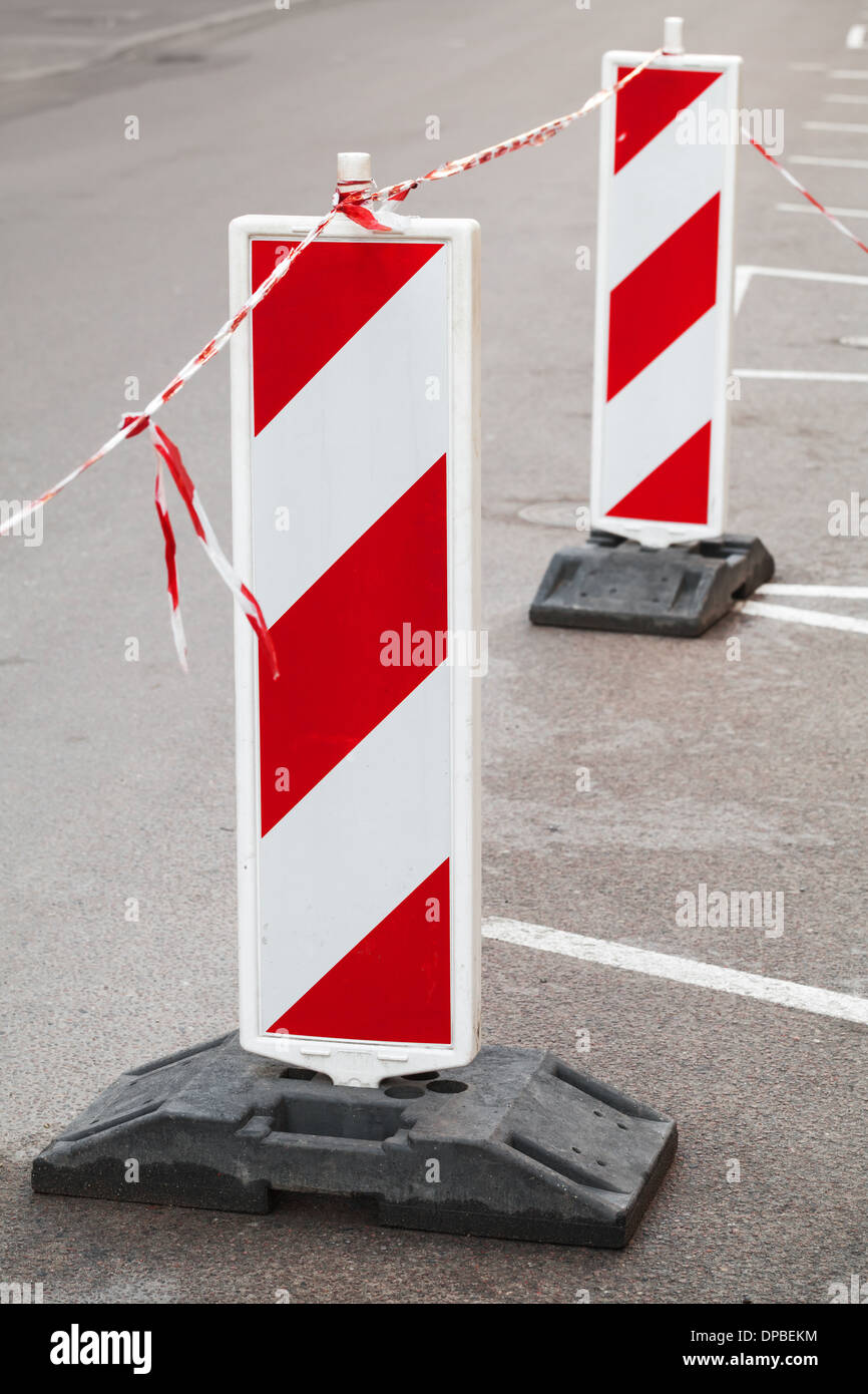 Red and white barrier signs. Road under construction Stock Photo - Alamy