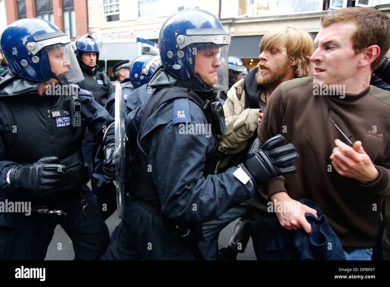 Metropolitan Police clash with protesters at Golden square in London ...