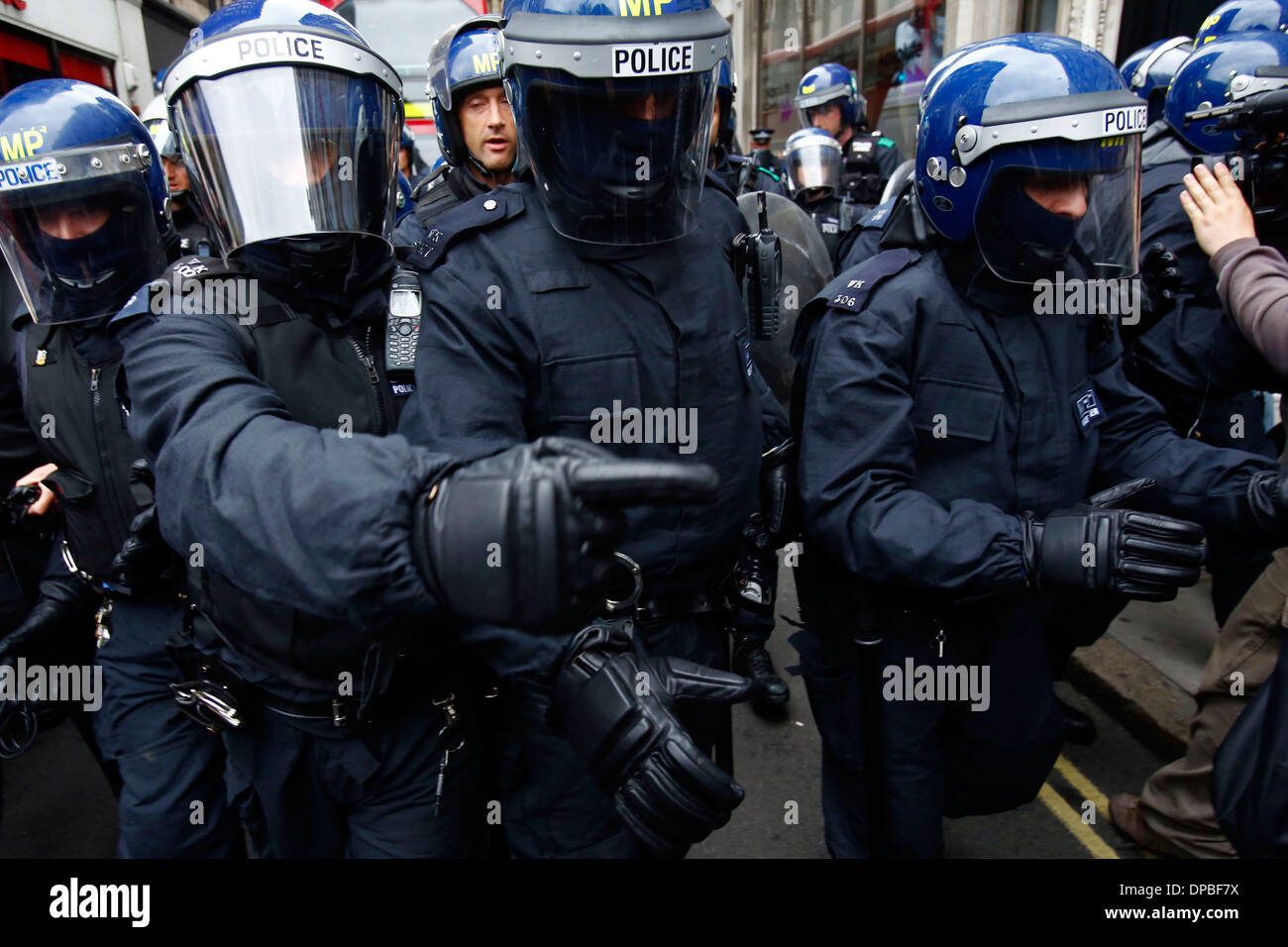 Metropolitan Police clash with protesters at Golden square in London ...