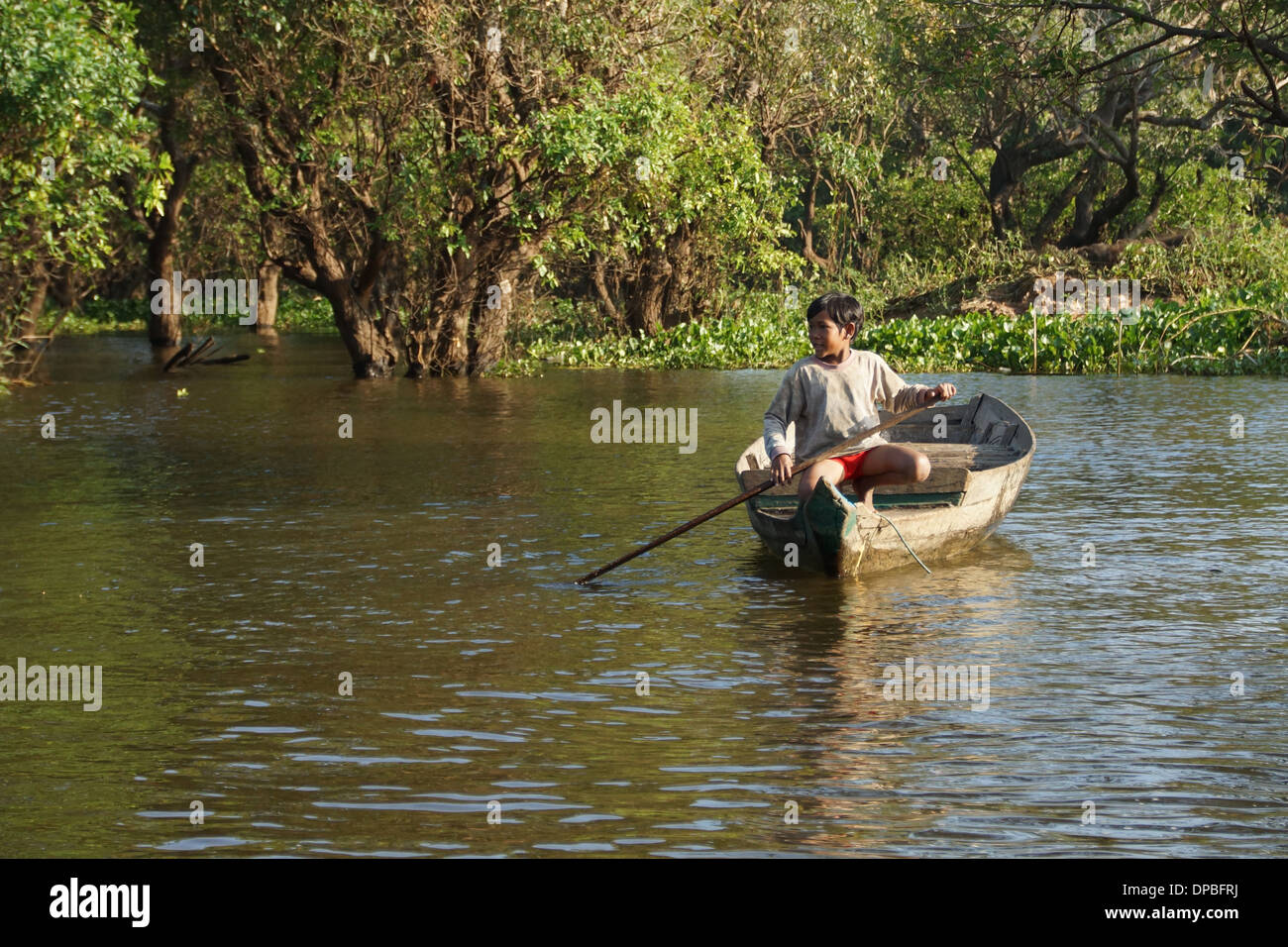 Boy with boat hi-res stock photography and images - Alamy