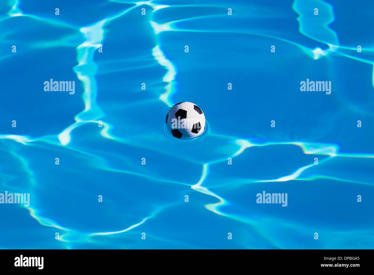 Floating soccer ball in water hi-res stock photography and images - Alamy