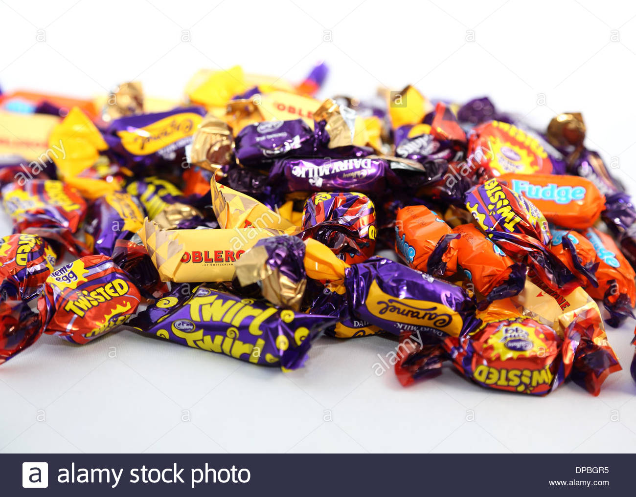 A pile of Cadbury chocolate sweets Stock Photo: 65408201 - Alamy