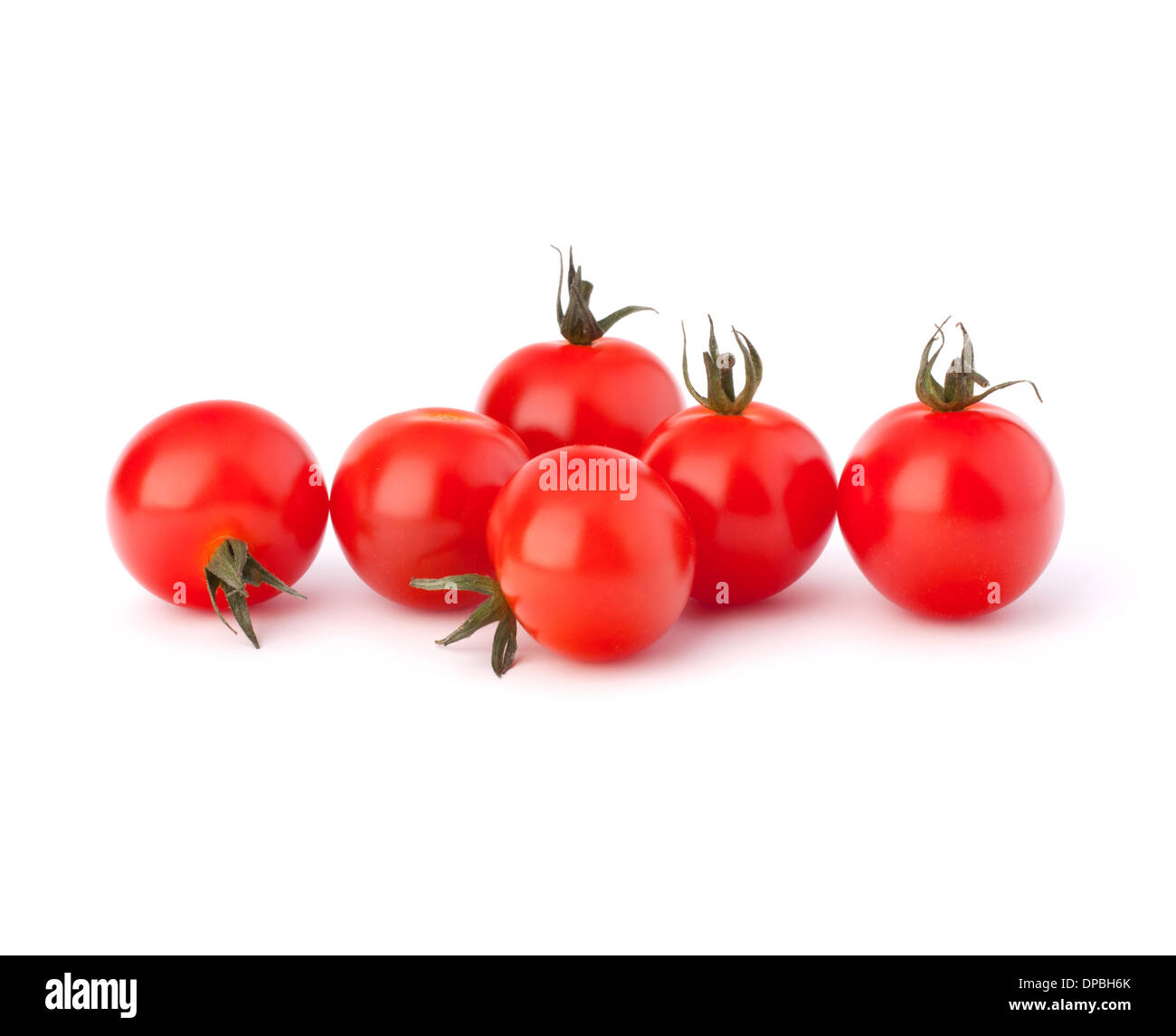 Small cherry tomato on white background close up Stock Photo - Alamy