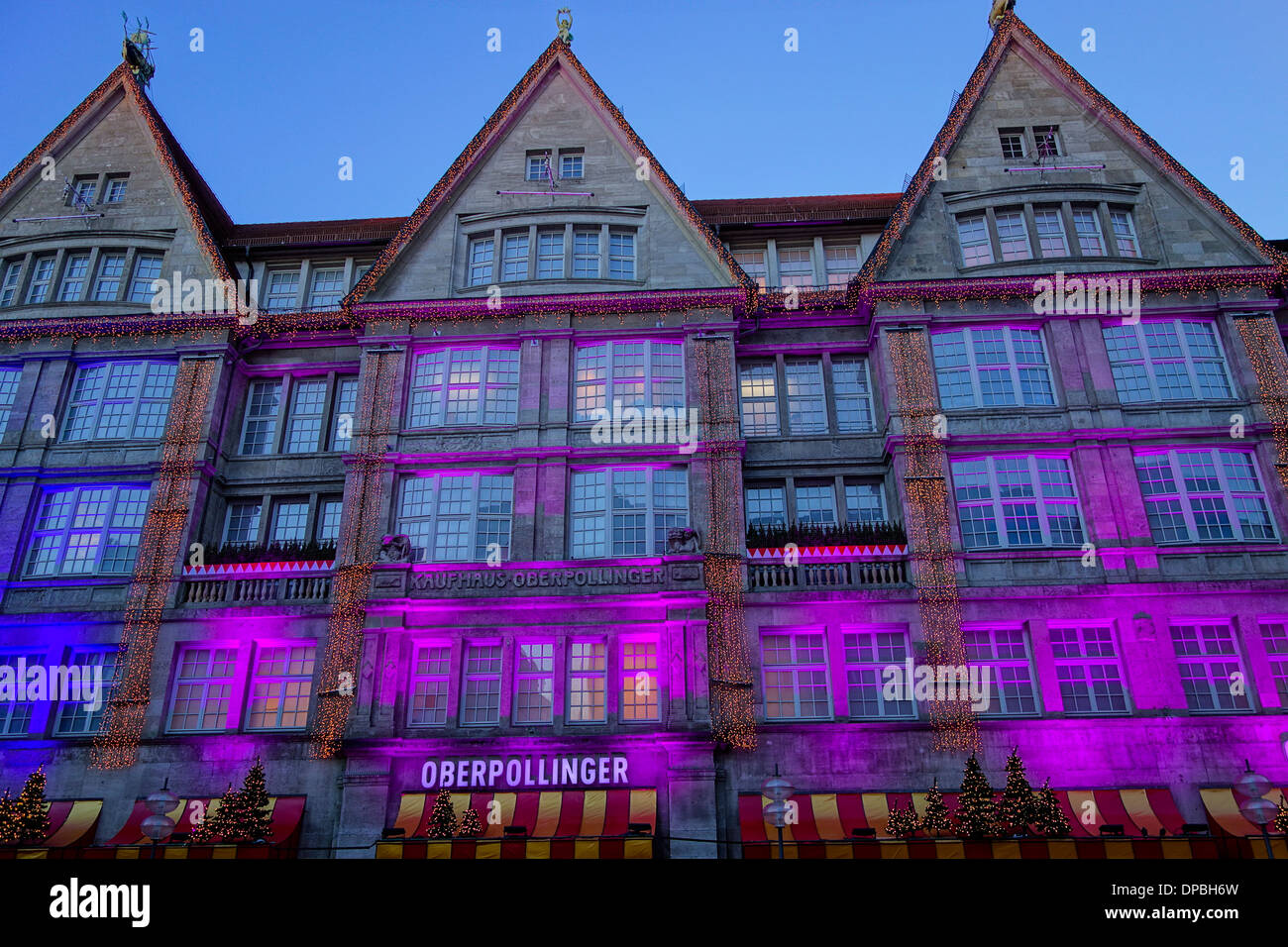 Christmas shopping, colorful illuminated facade of the department store ...