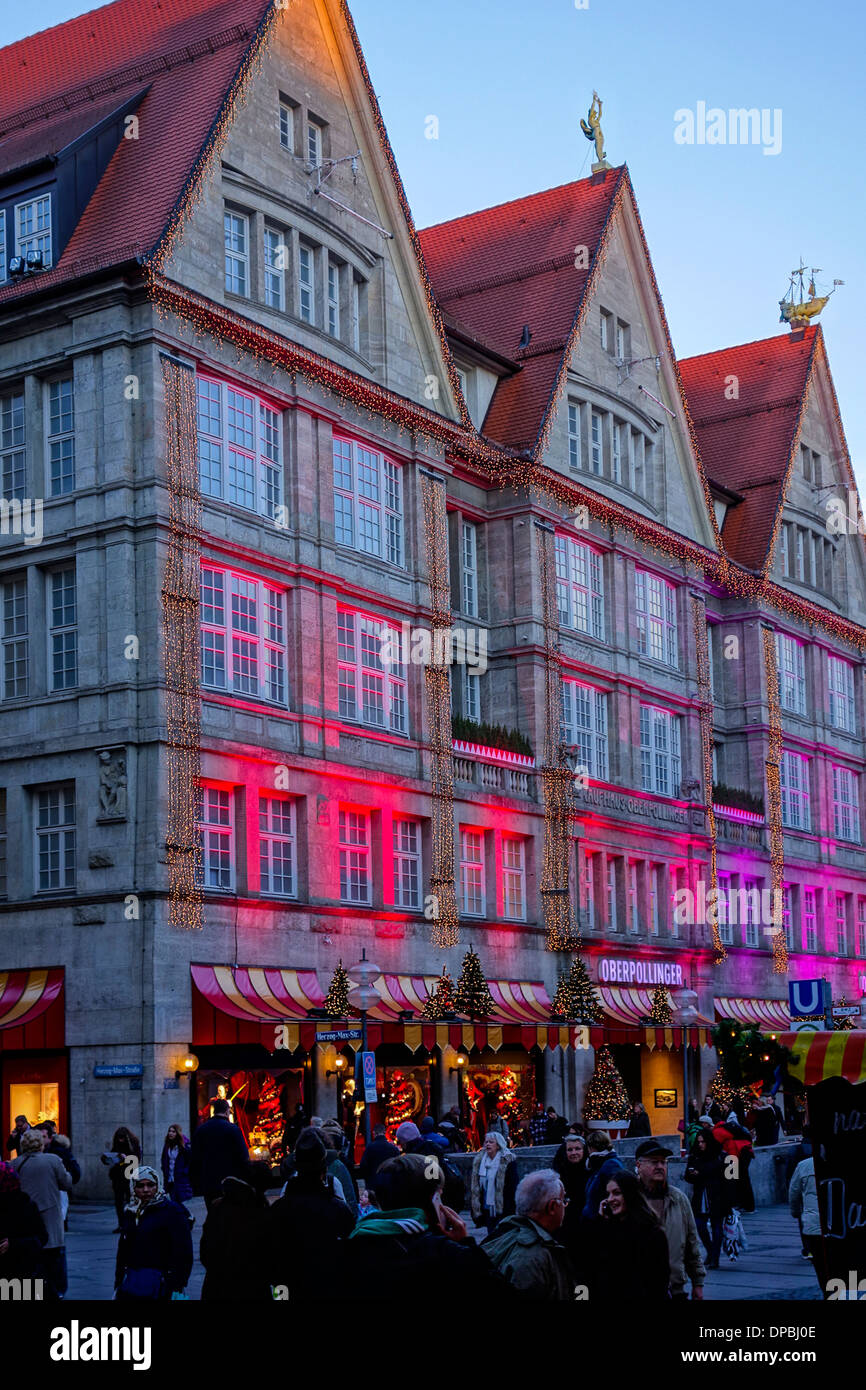 Christmas shopping, colorful illuminated facade of the department store ...