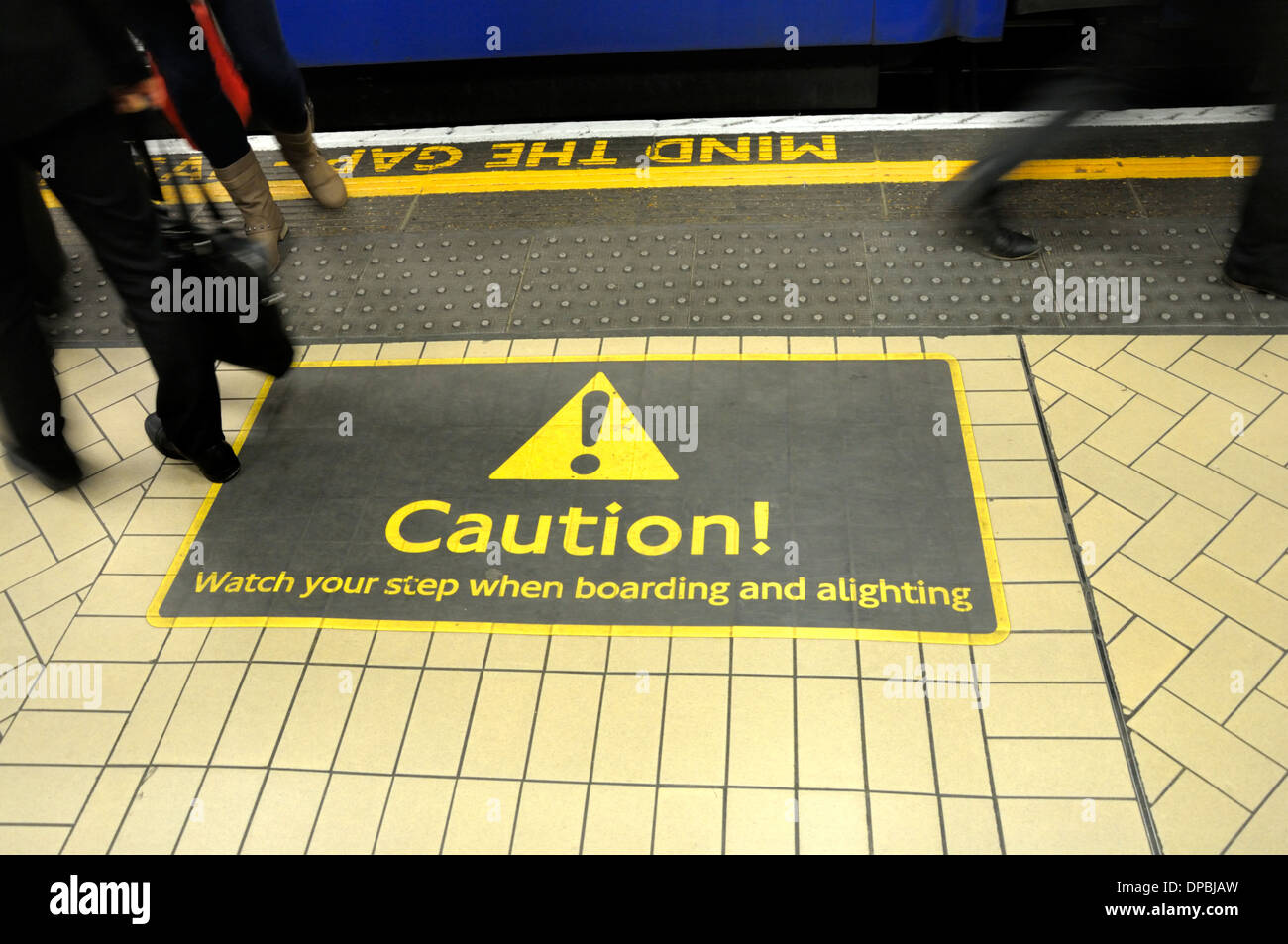 London, England, UK. Tube station - Warning on platform Stock Photo - Alamy