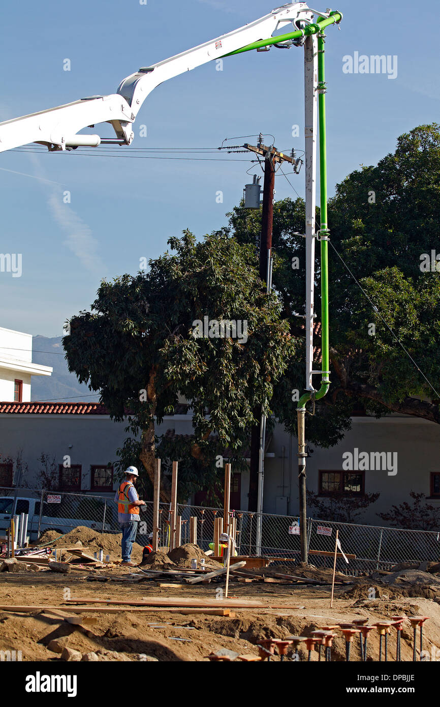 Construction Worker Pumping Concrete Stock Photo - Alamy