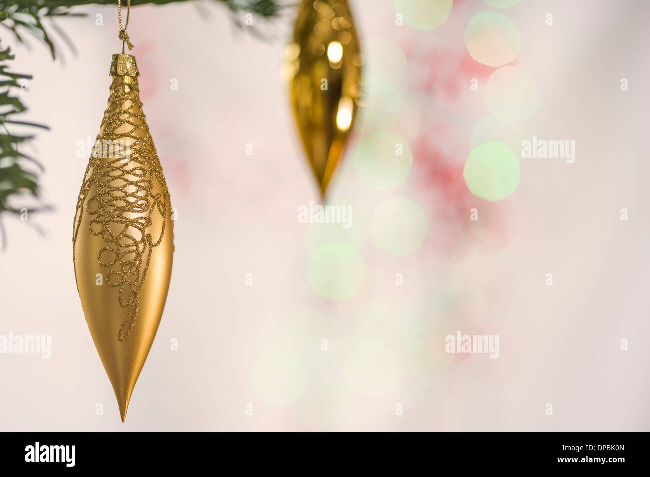 Christmas bauble decorations hanging from a tree Stock Photo - Alamy