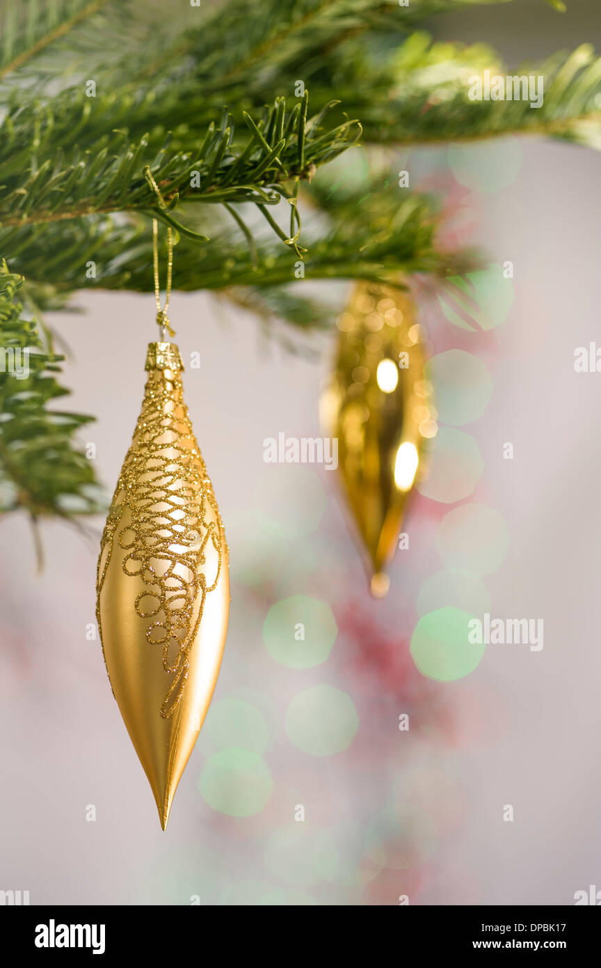 Christmas bauble decorations hanging from a tree Stock Photo - Alamy