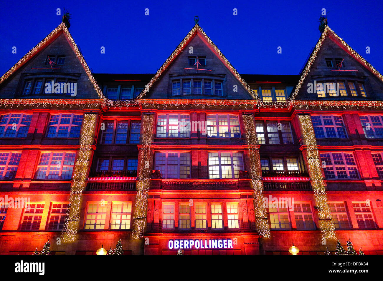 Christmas shopping, colorful illuminated facade of the department store ...