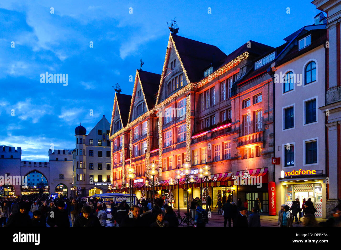 Christmas shopping, colorful illuminated facade of the department store ...