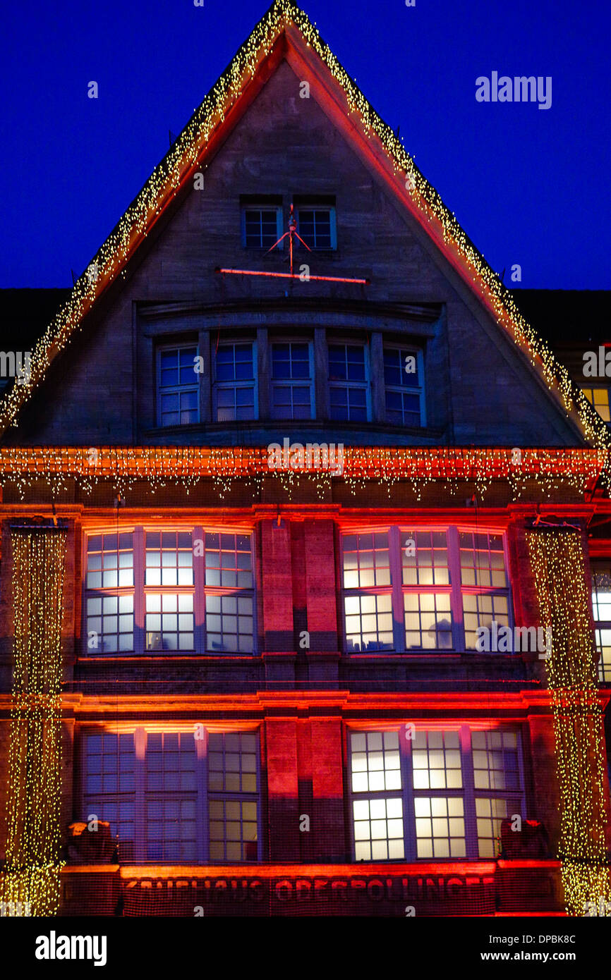 Christmas shopping, colorful illuminated facade of the department store ...