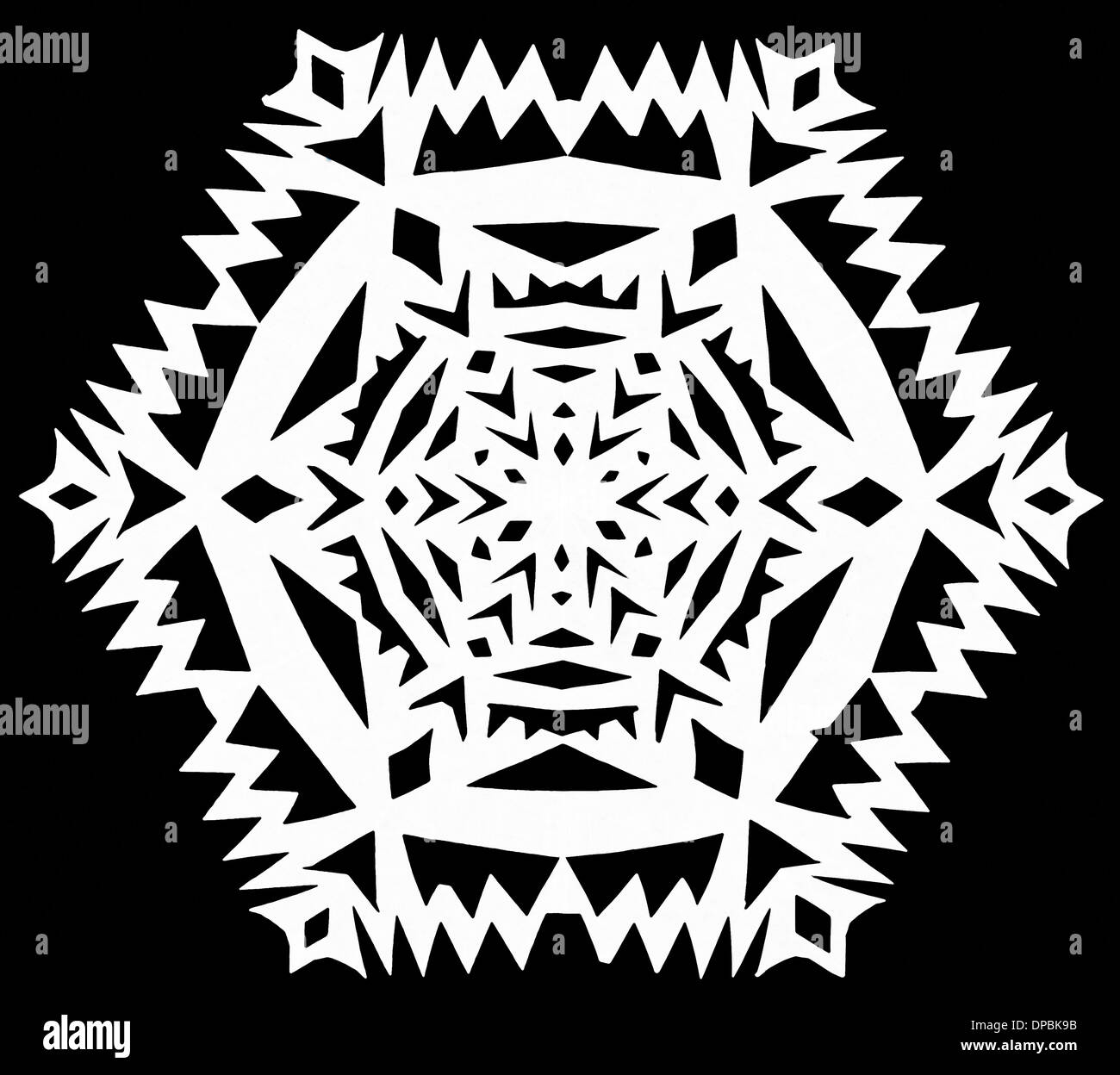 hand made cut out white snowflake on black paper background Stock Photo ...