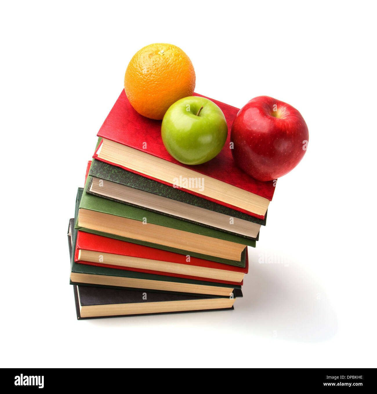 book stack with fruits isolated on white background Stock Photo - Alamy