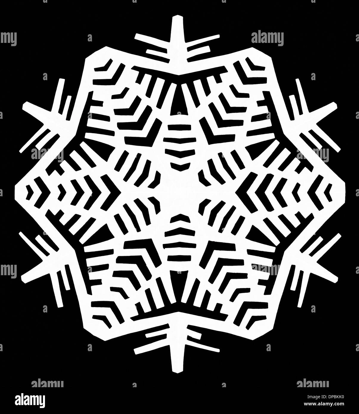 hand made cut out white snowflake on black paper background Stock Photo ...