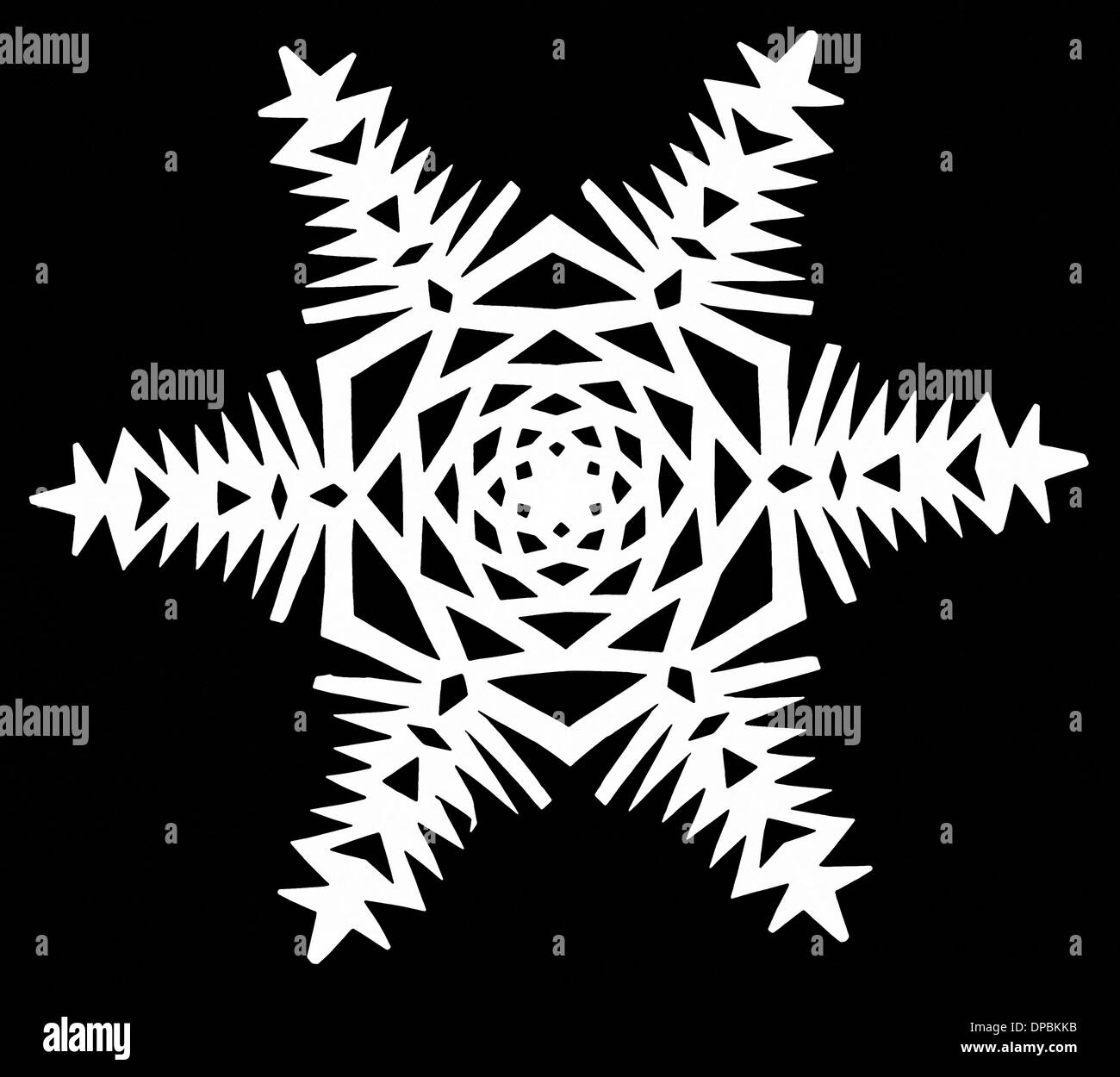 hand made cut out white snowflake on black paper background Stock Photo ...