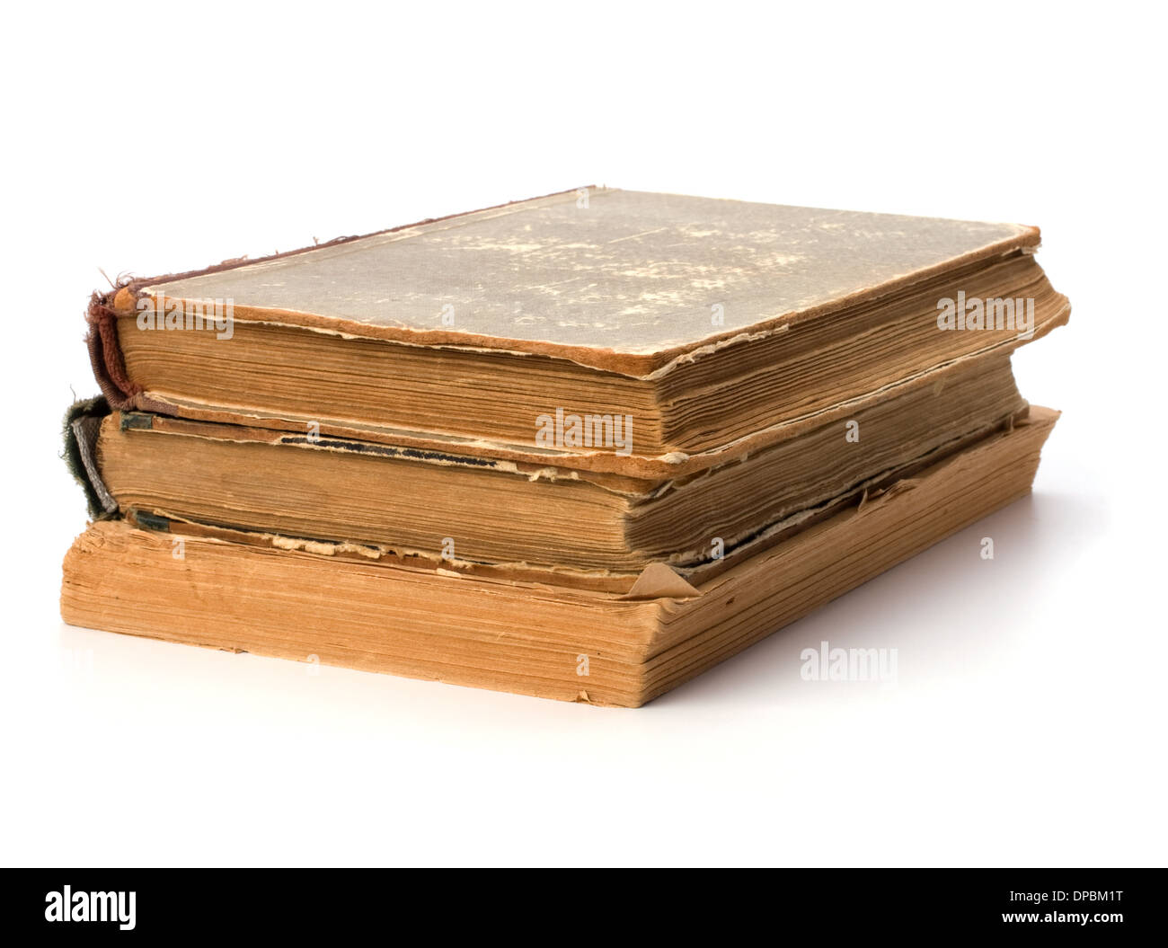 tattered book stack isolated on white background Stock Photo - Alamy