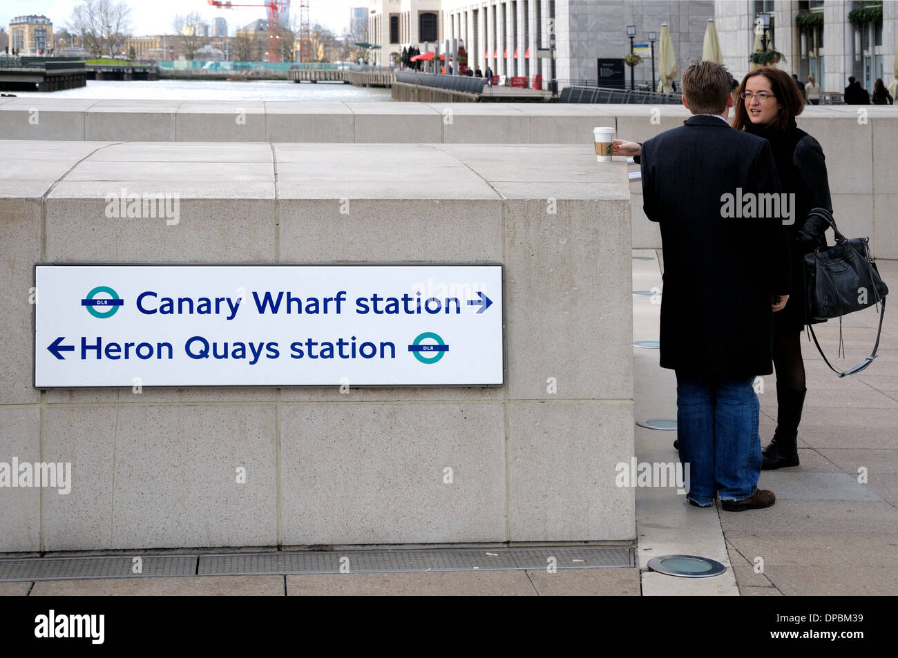 London, England, UK. Docklands / Canary Wharf. Sign giving directions ...
