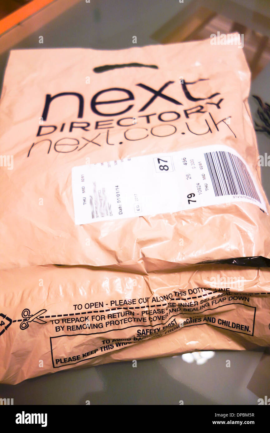 Next home delivery parcel Stock Photo - Alamy