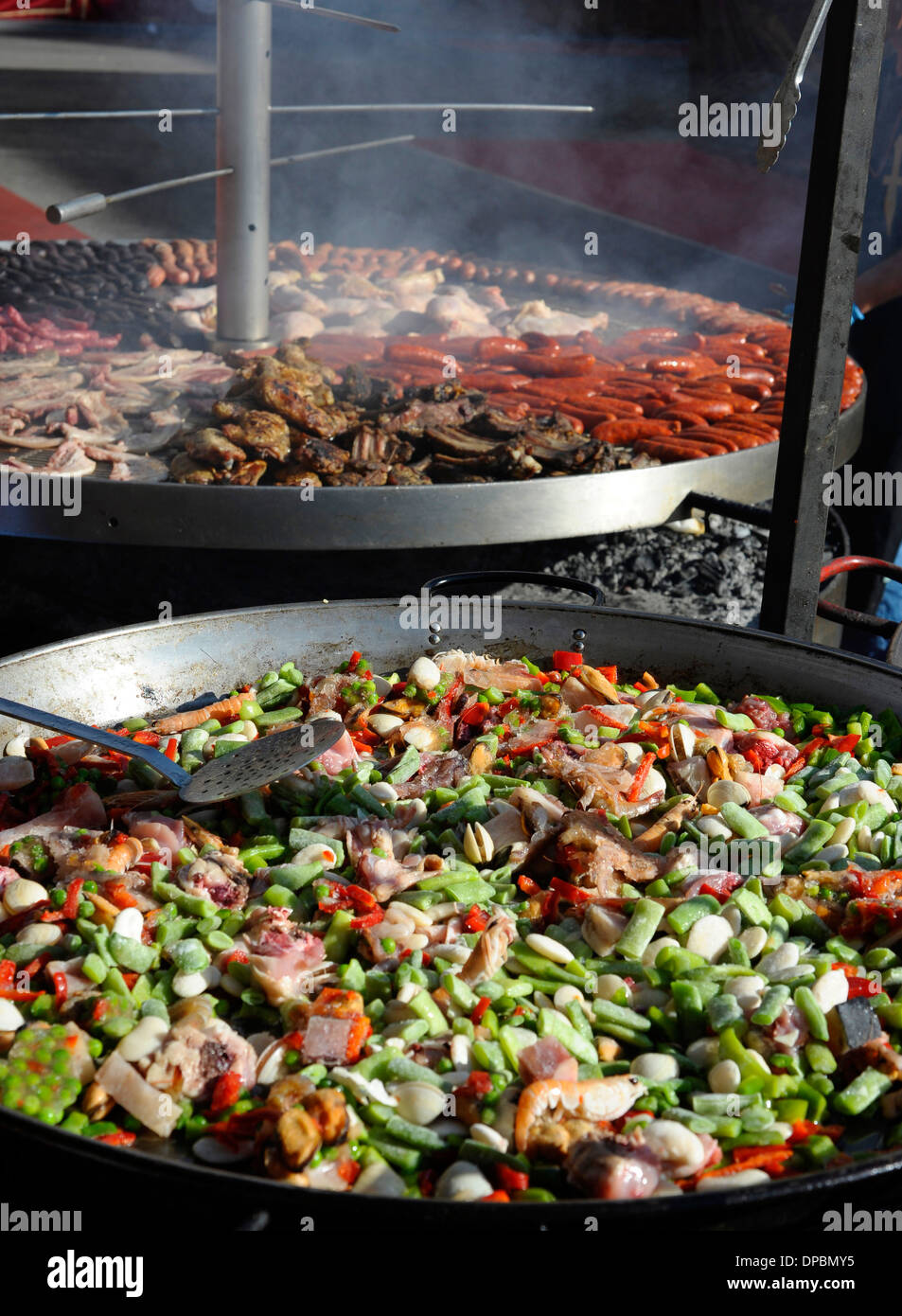 large pan containing ingredients for the preparation of a paella in ...