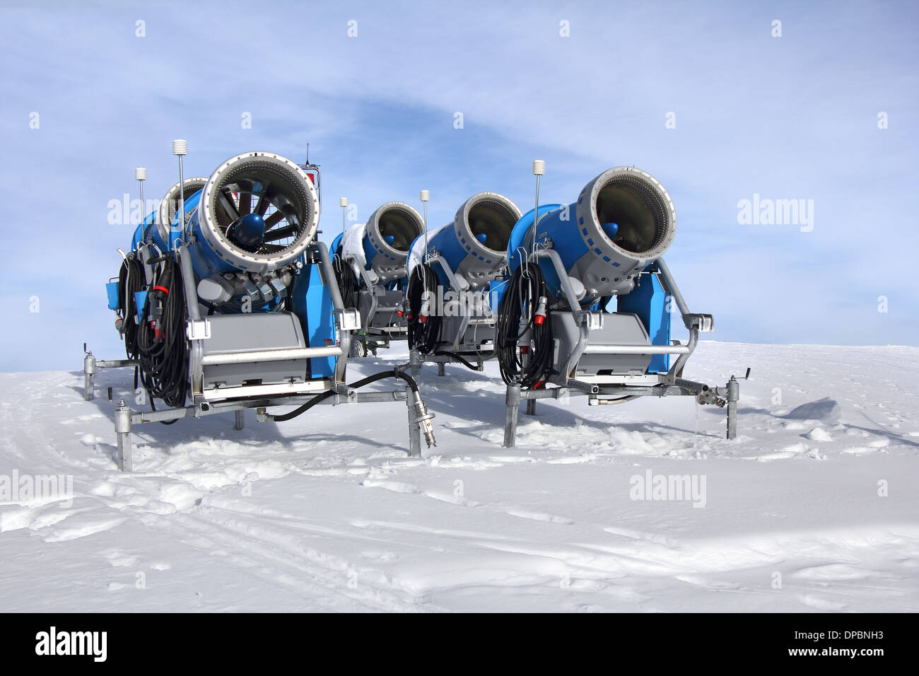 Five blue Snow Cannons for making snow Stock Photo - Alamy