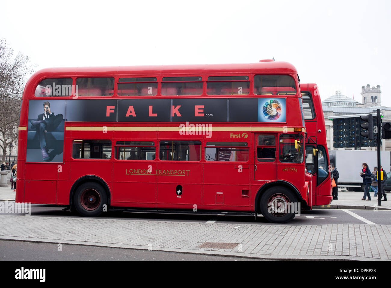 Red double decker buses in Trafalgar square in London, UK Stock Photo ...