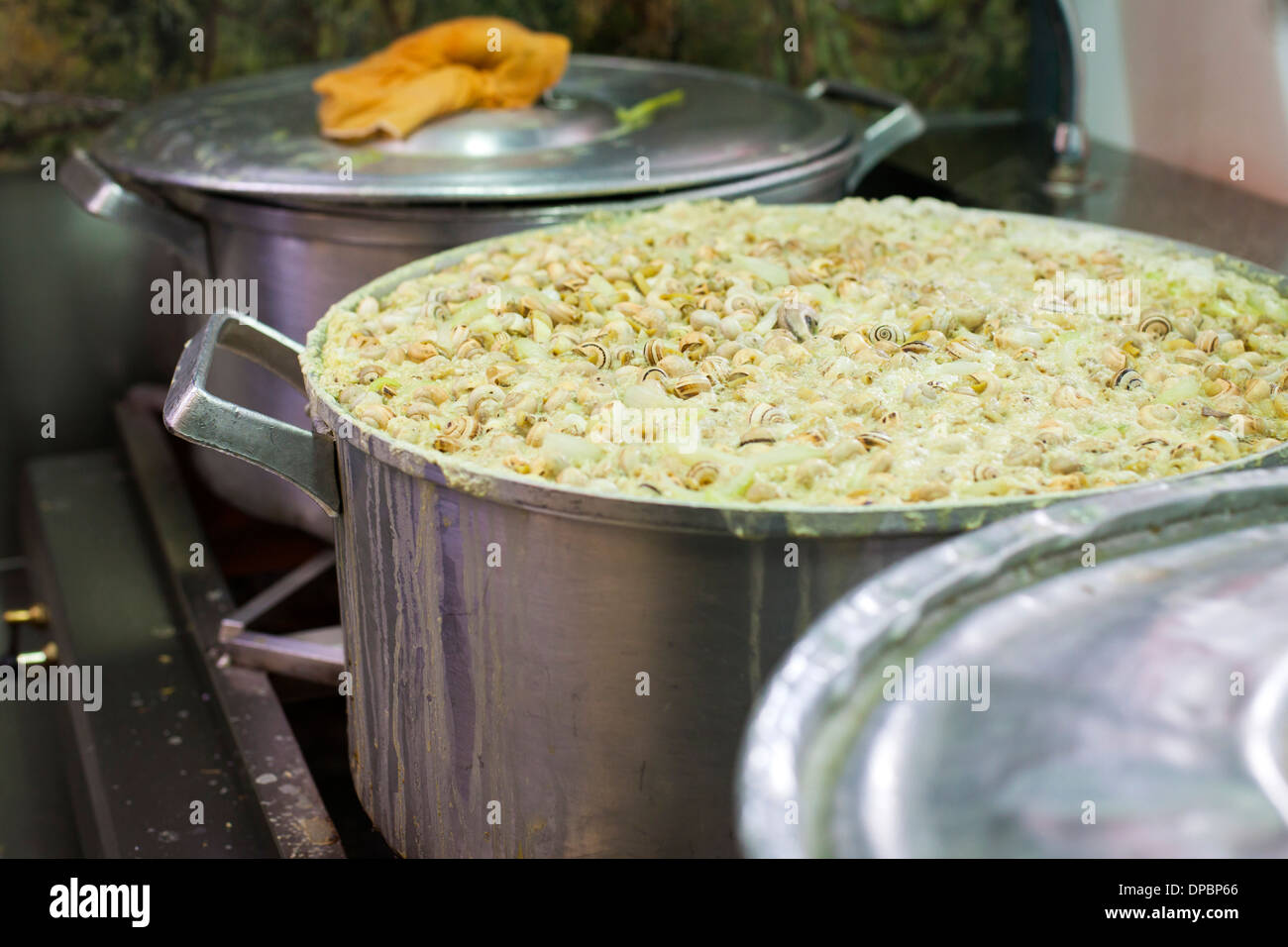 Snails being cooked in pan at Júlio dos Caracóis (Snails) restaurant ...
