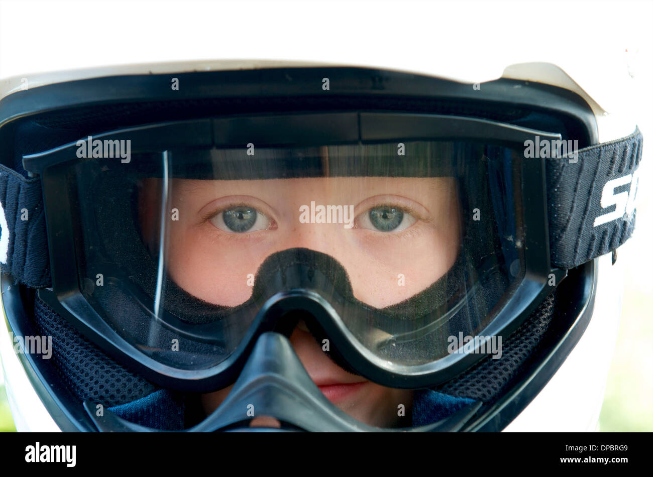 Boy with motorcycle helmet hi-res stock photography and images - Alamy