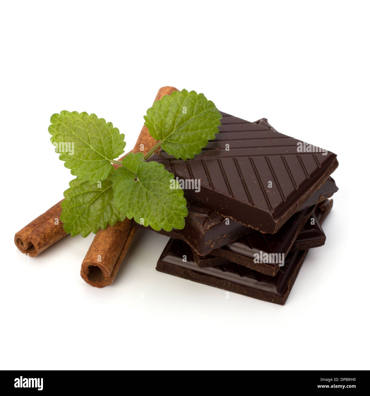 Chocolate bars stack and cinnamon sticks isolated on white background ...