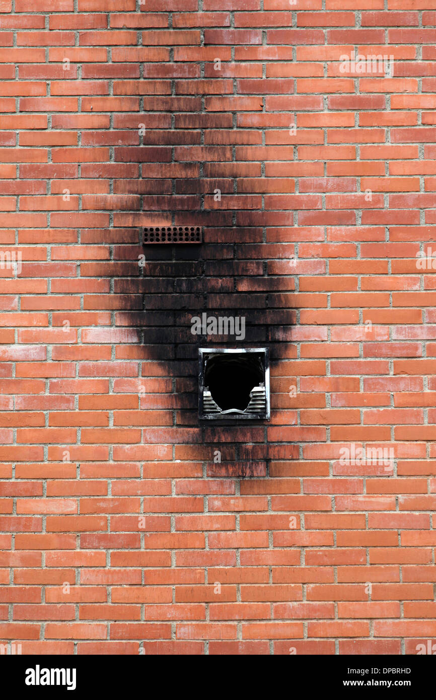Spain, Burnt window in brick wall Stock Photo - Alamy