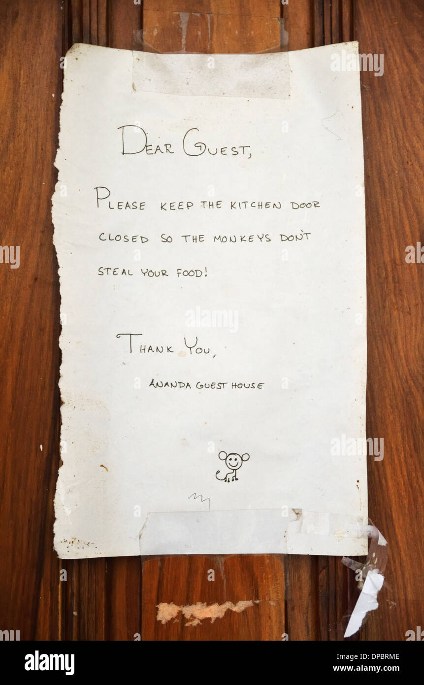 English language note on a communal kitchen door of guesthouse ...