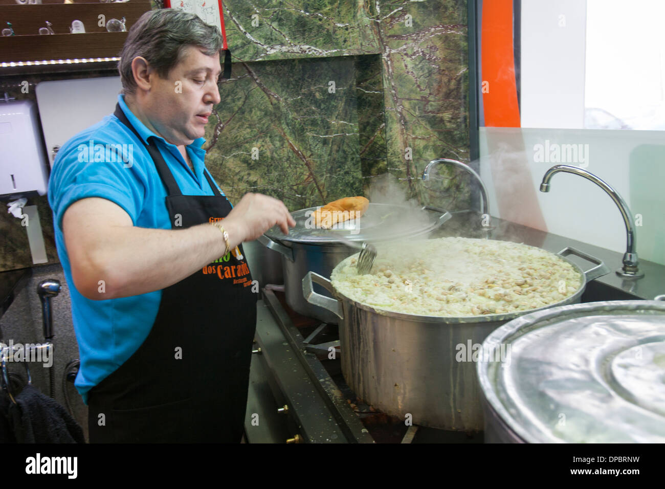 Snails being cooked in pan at Júlio dos Caracóis (Snails) restaurant ...