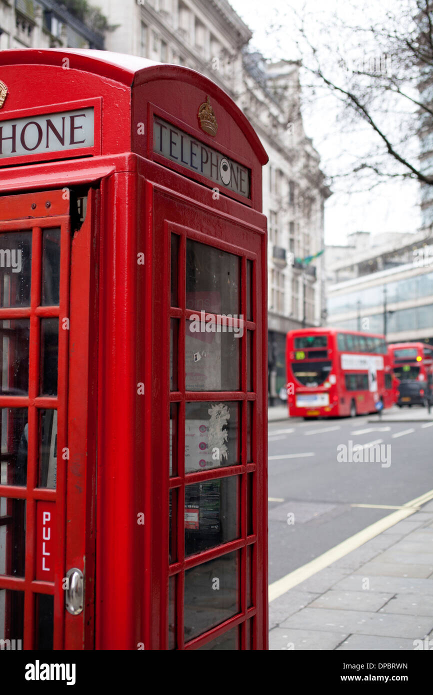 Red Phone booth and double decker buses in London Stock Photo - Alamy