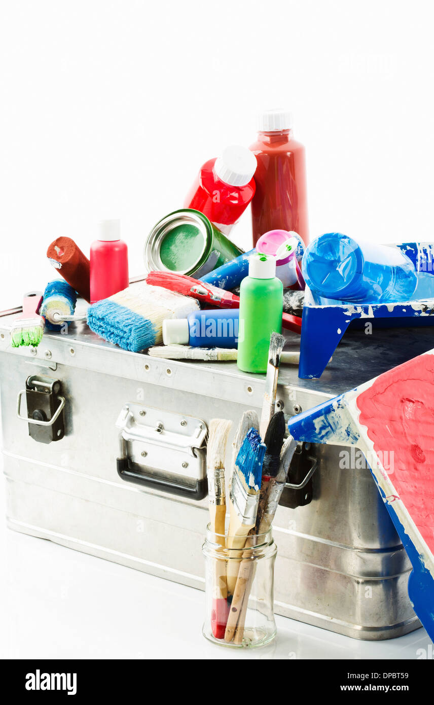 Painting tools, brushes, paint bottles on alu box Stock Photo - Alamy