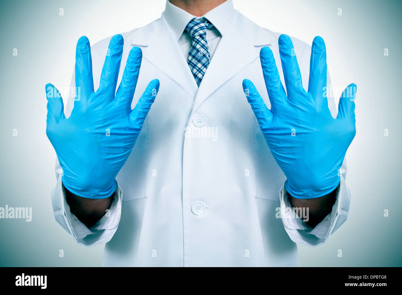 Person wearing medical gloves hi-res stock photography and images - Alamy
