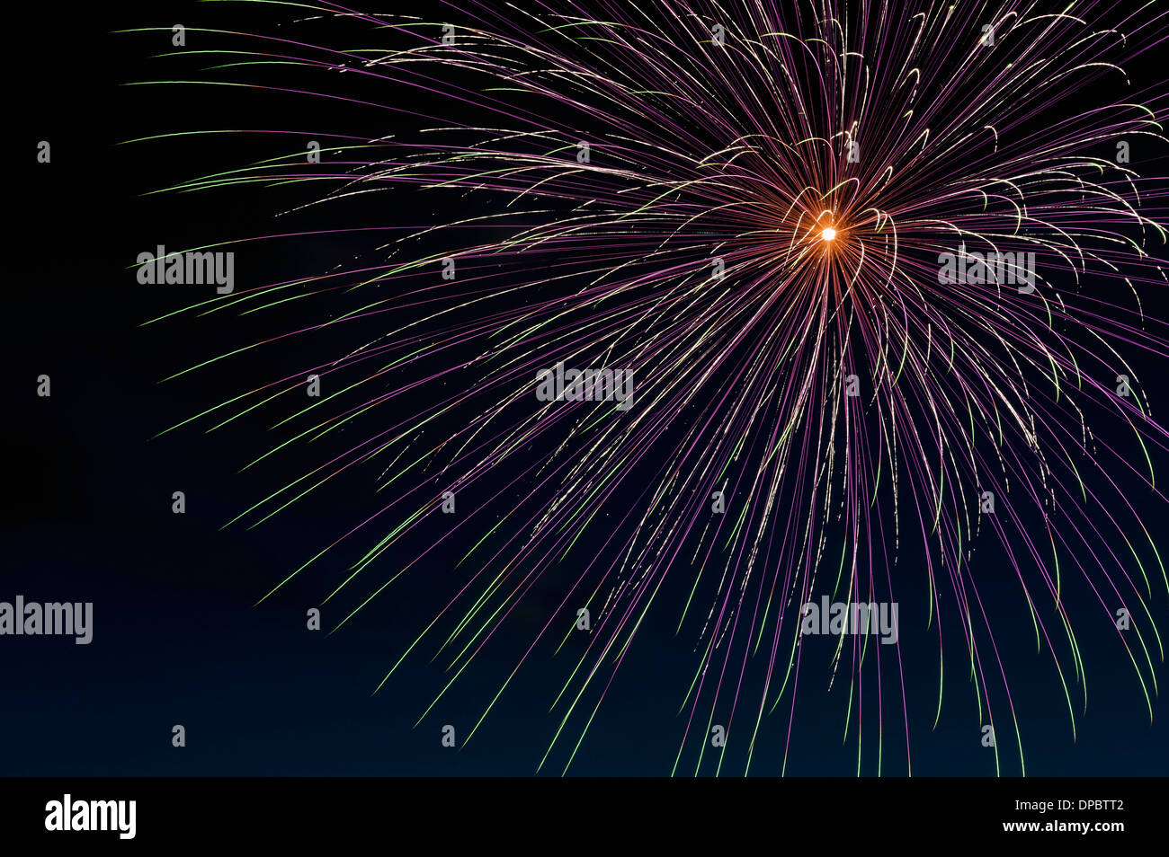 Fireworks exploding in the sky at night Stock Photo - Alamy