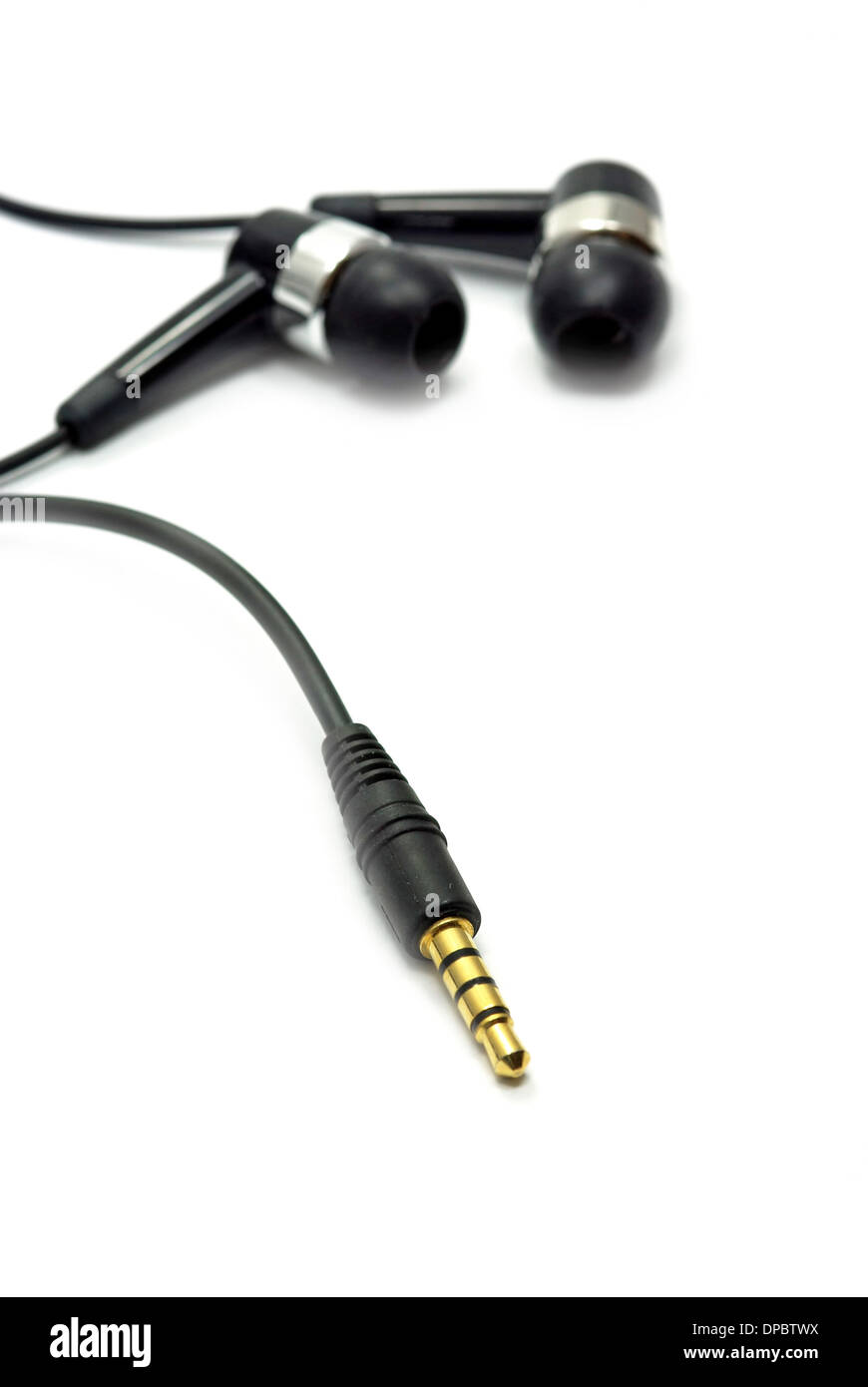 Audio jack and earphone on white (the focus is on the jack Stock Photo ...