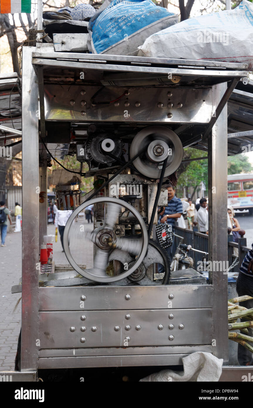 A cane sugar drink stand in Bombay India Stock Photo - Alamy