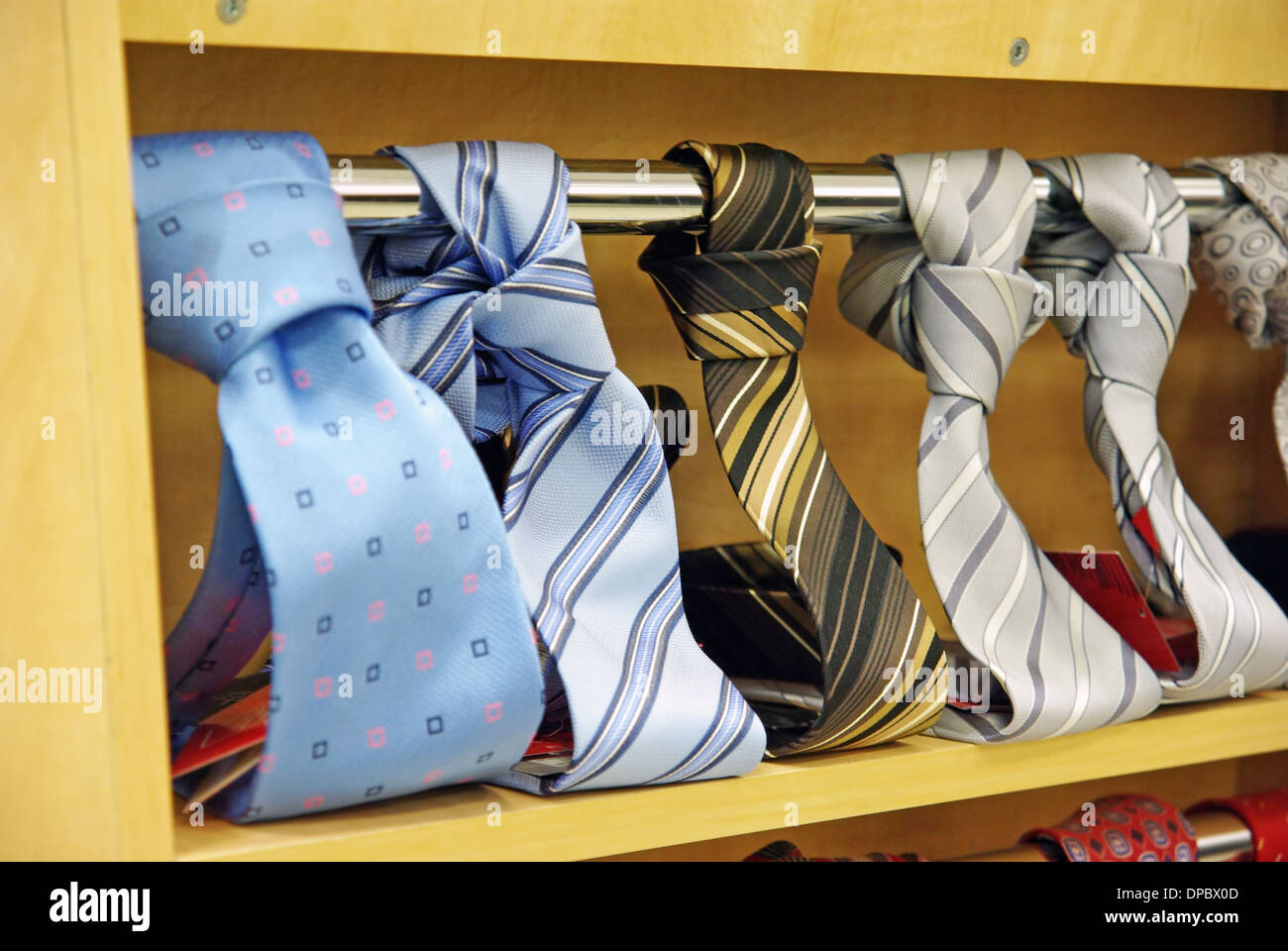 Colored men's necktie in a shop, close image Stock Photo - Alamy