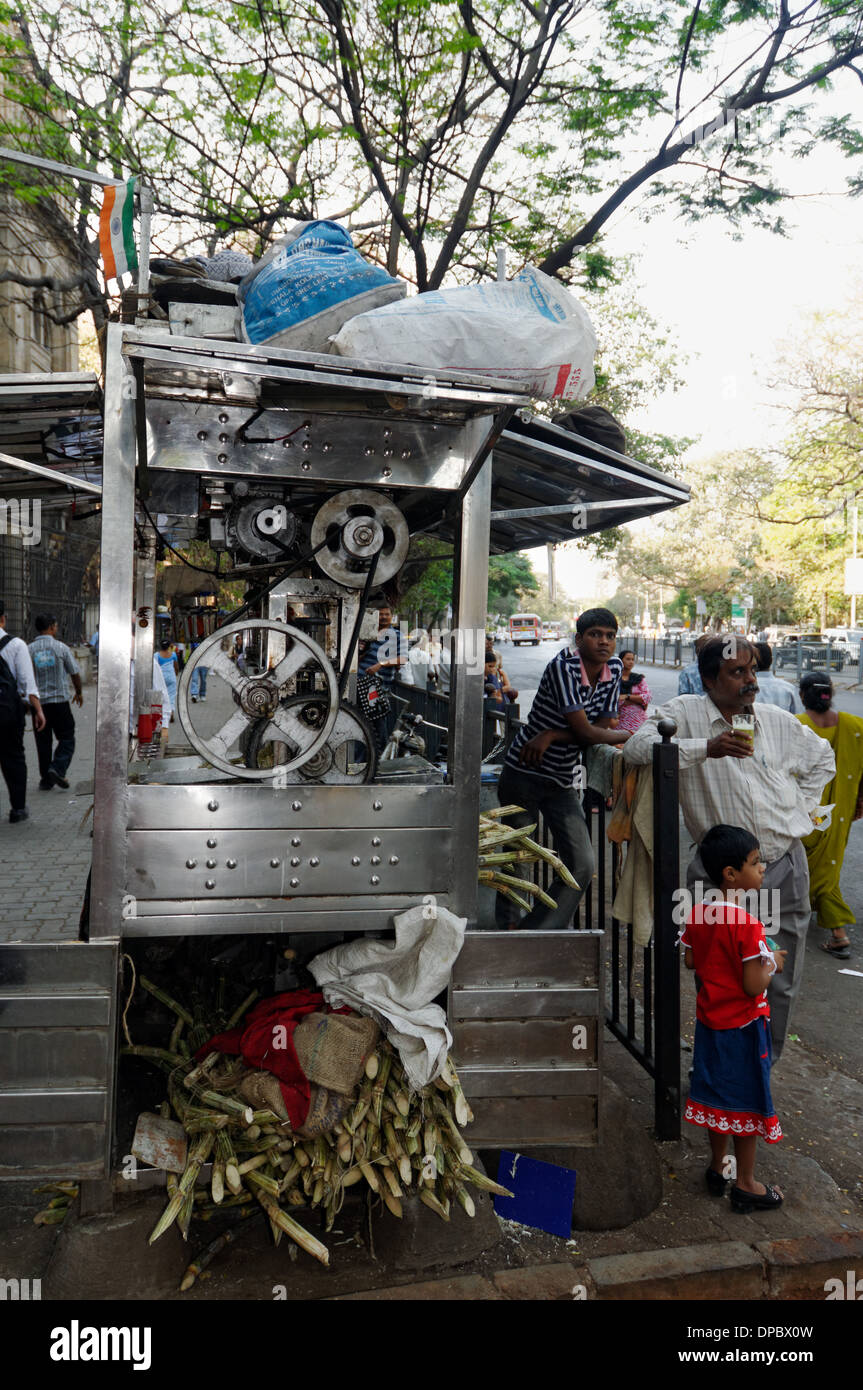 A cane sugar drink stand in Bombay India Stock Photo - Alamy