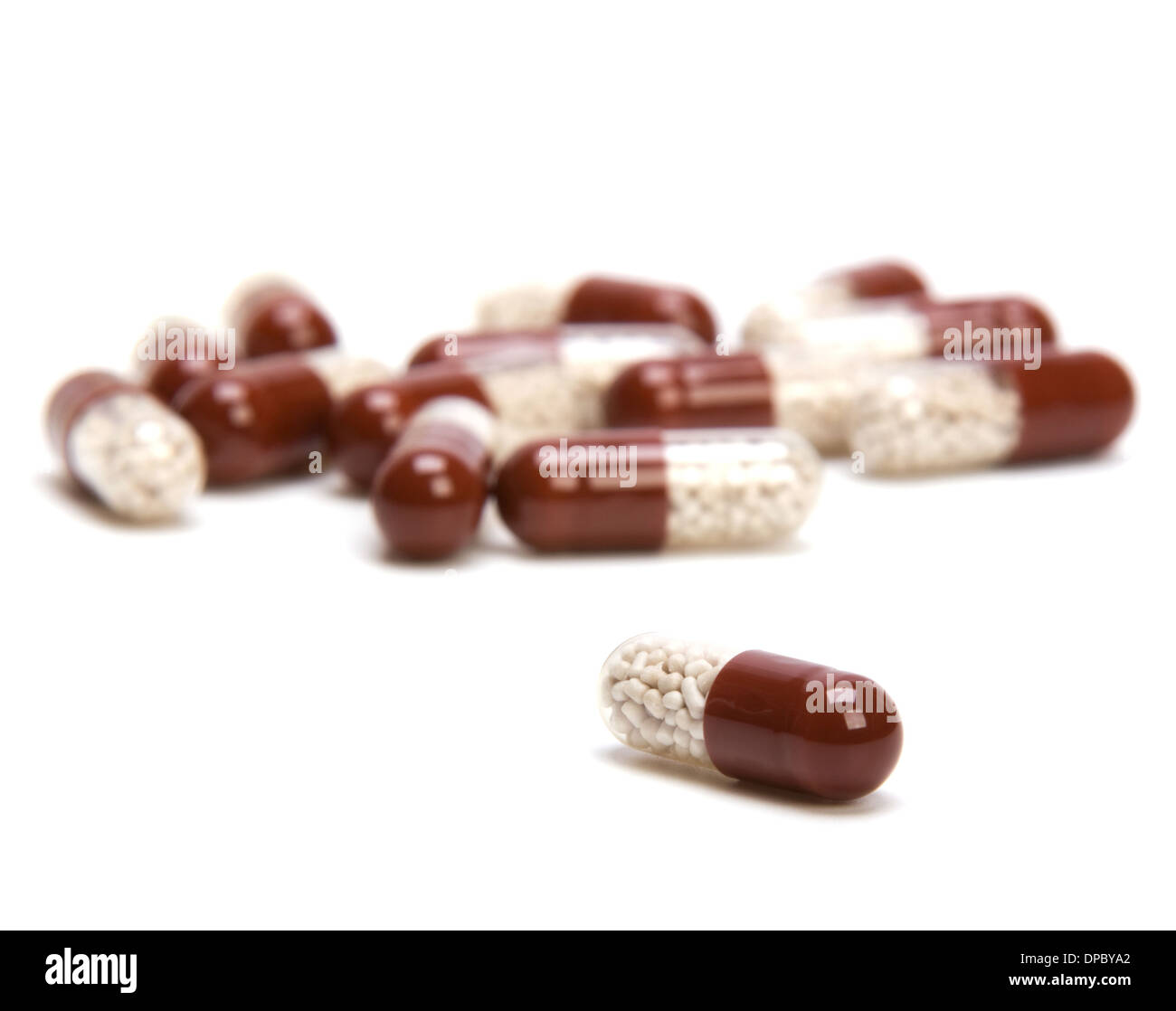 Capsules isolated on white background Stock Photo - Alamy