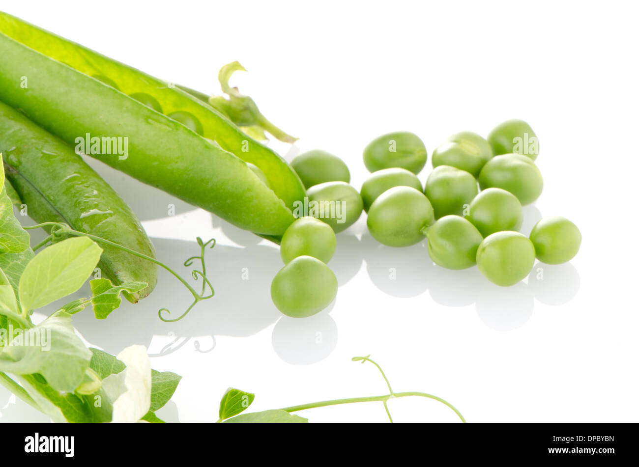 Fresh green pea pod on white background Stock Photo - Alamy